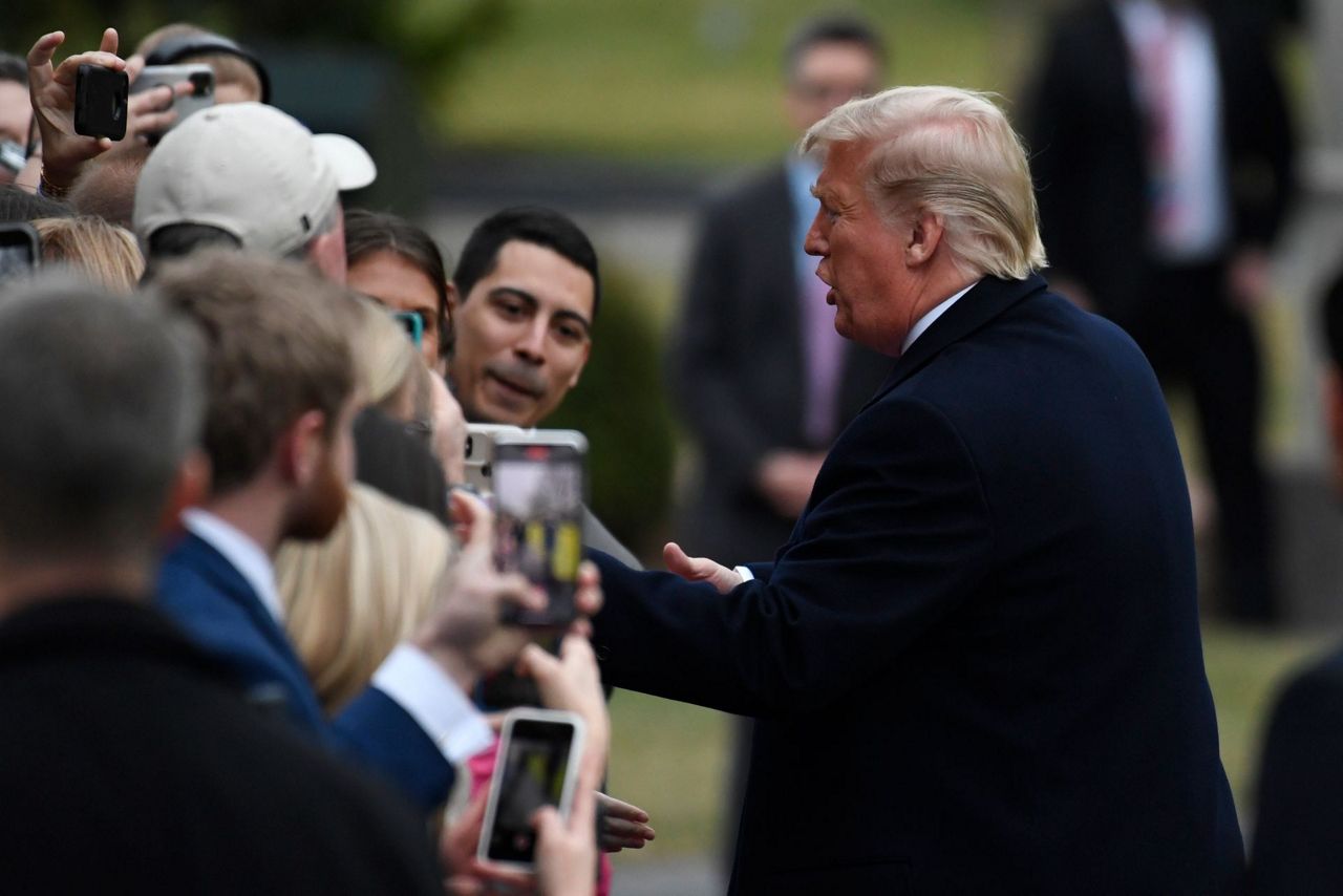 Trump to become fan in chief at college football title game