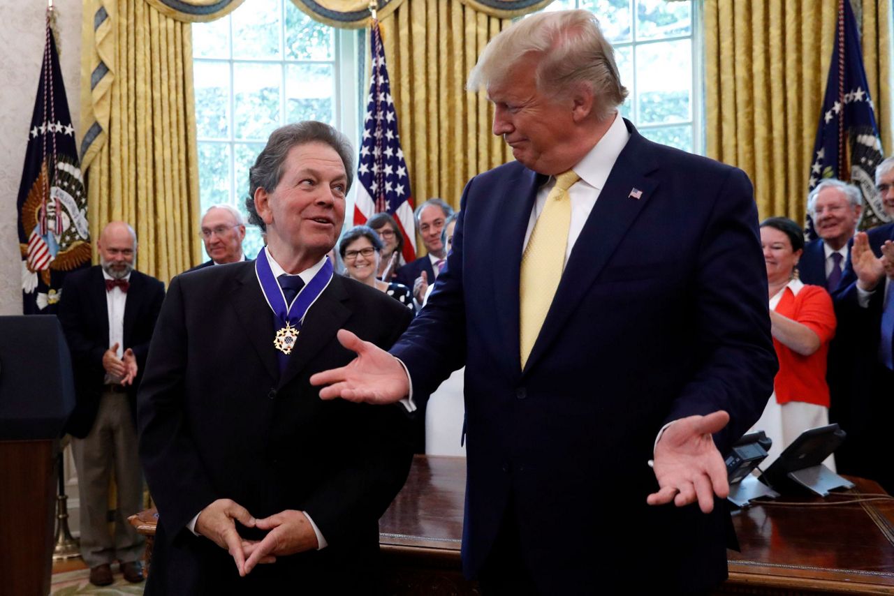 Trump honors economist who advised him on lowering taxes