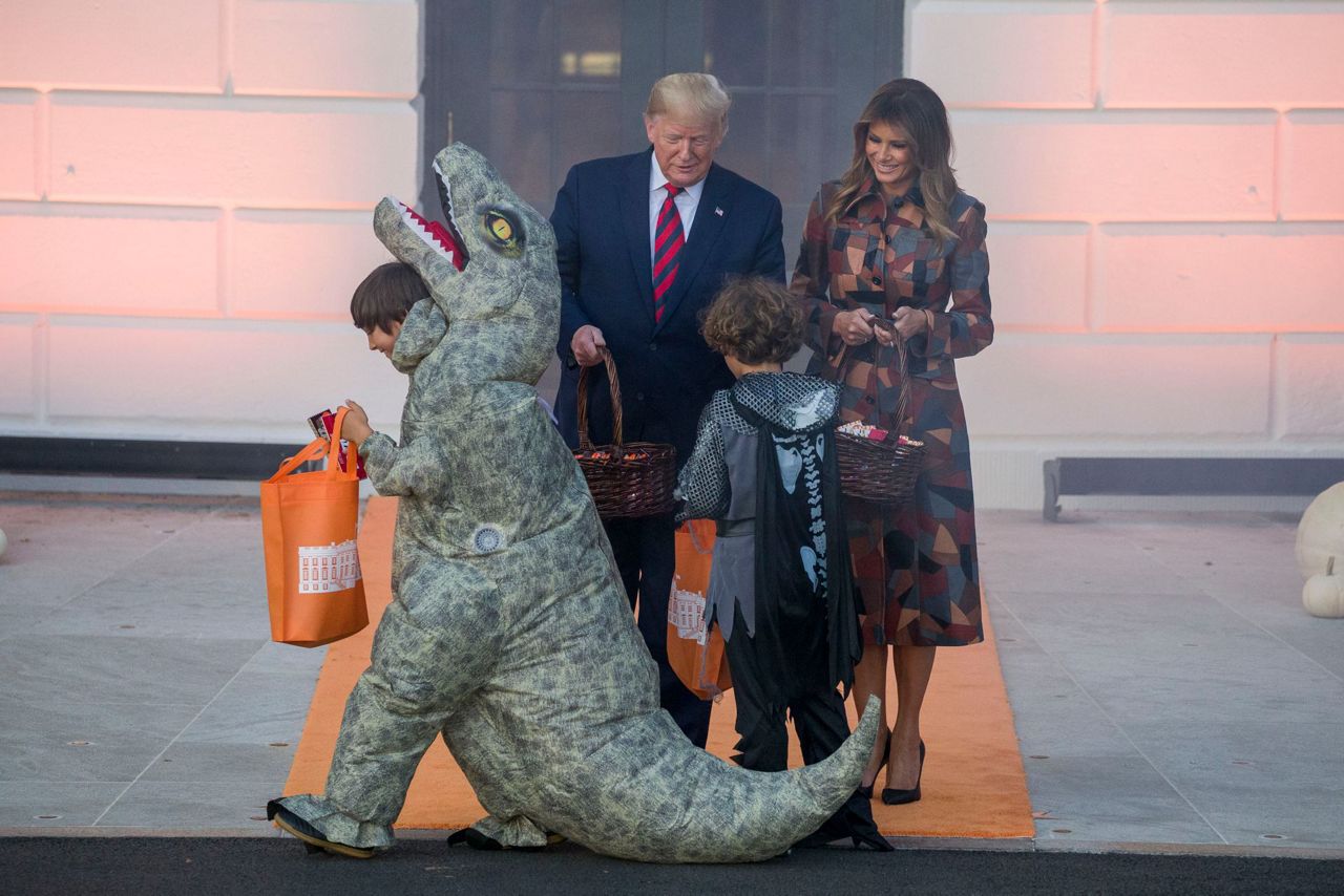 Trumps hand out Halloween candy, greet kids at White House