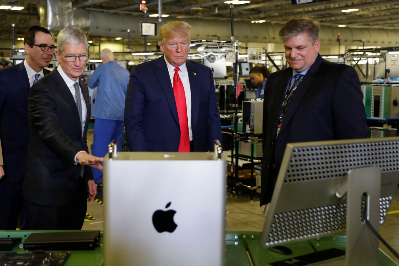 Escaping impeachment, Trump to showcase Apple plant in Texas