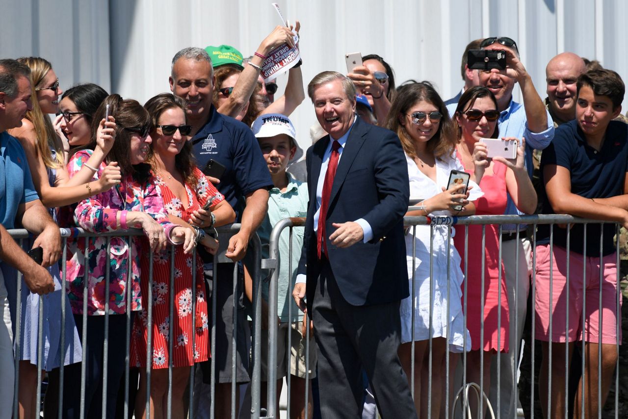 Trump defends Hamptons fundraiser billionaire host