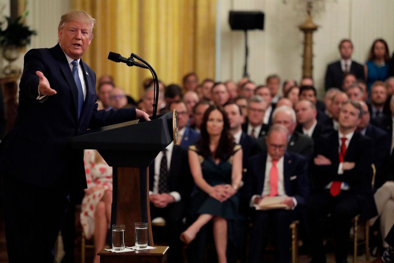 The Latest: Trump lauds environmental record; critics scoff