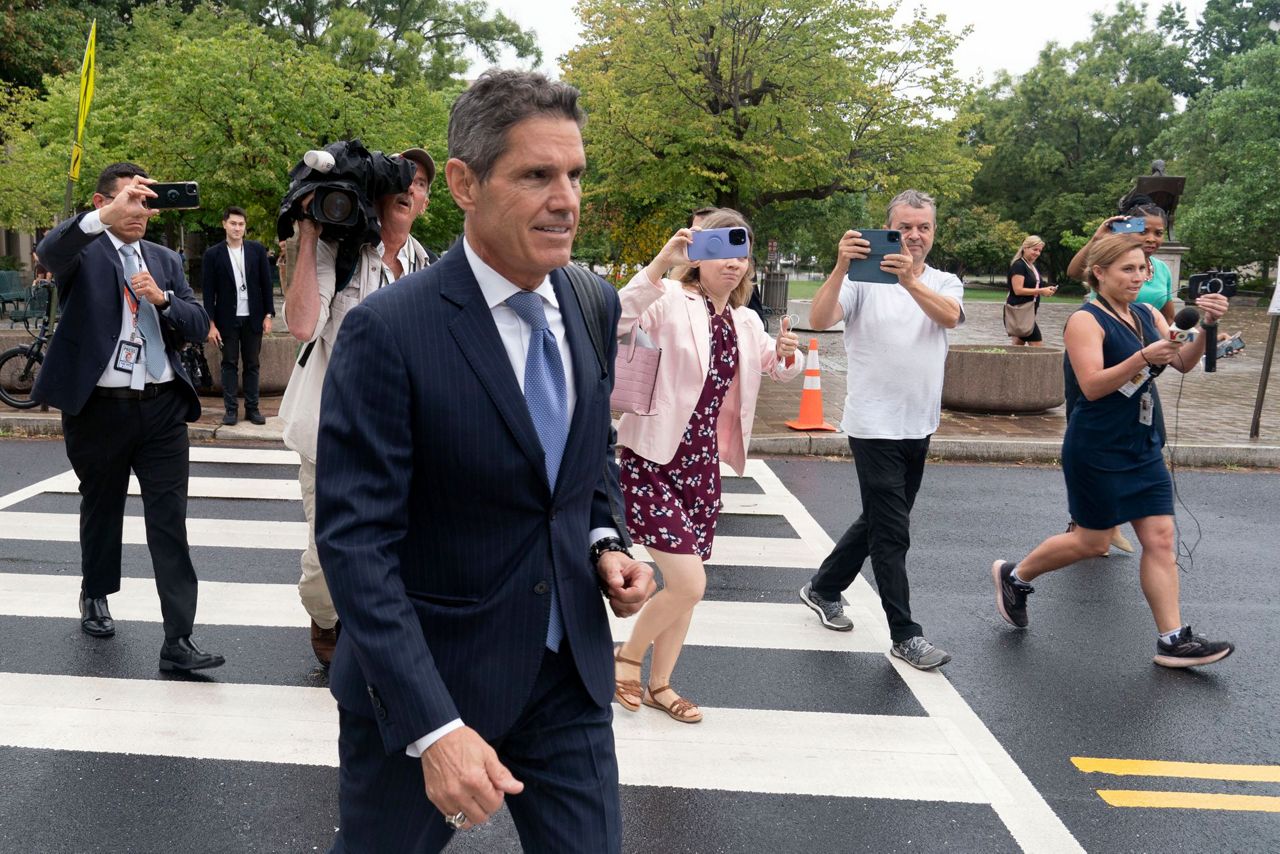 Trump lawyers back in DC court as two sides differ over trial date in ...