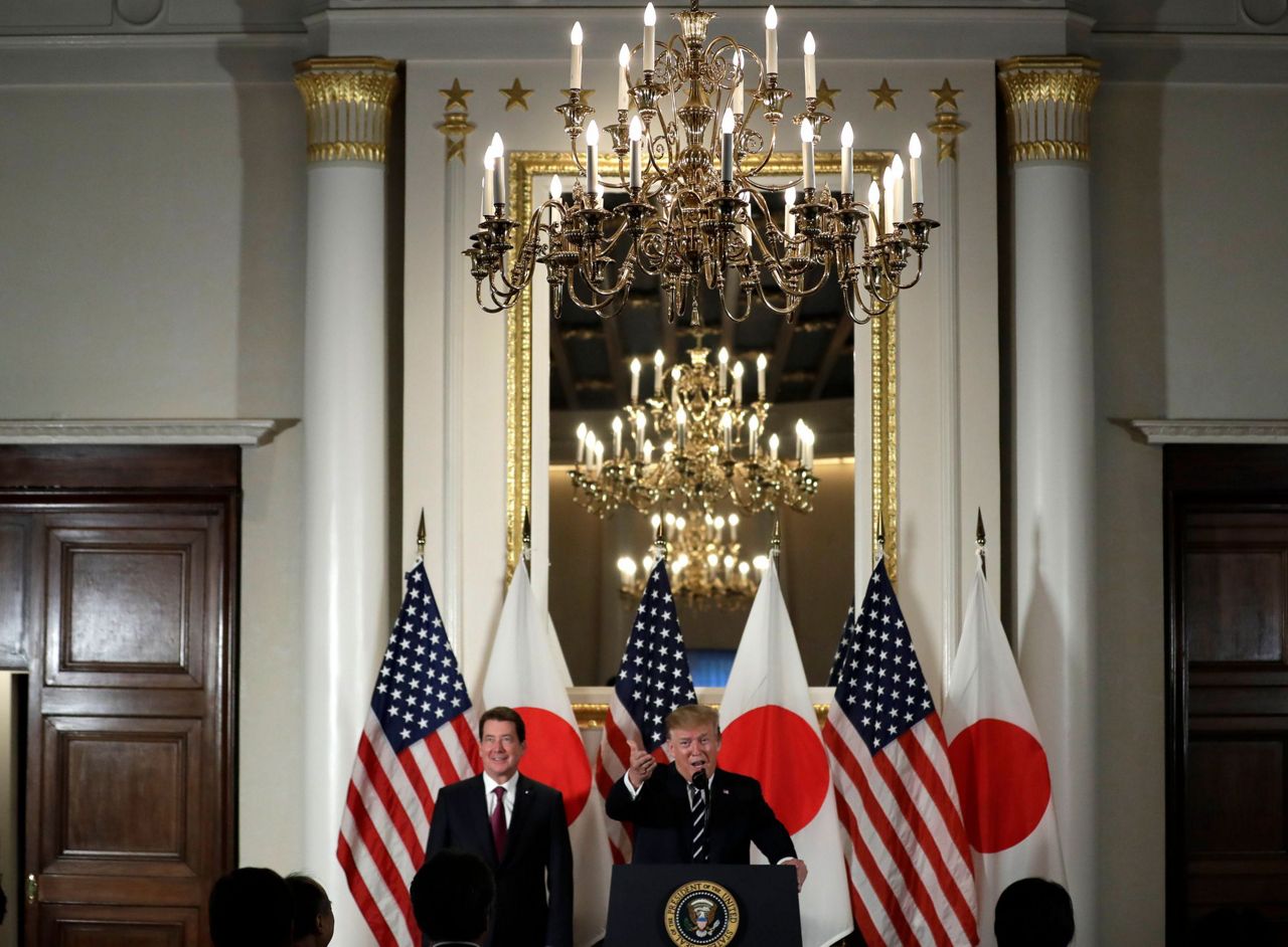 Japan welcomes Trump with a charm campaign, golf and sumo