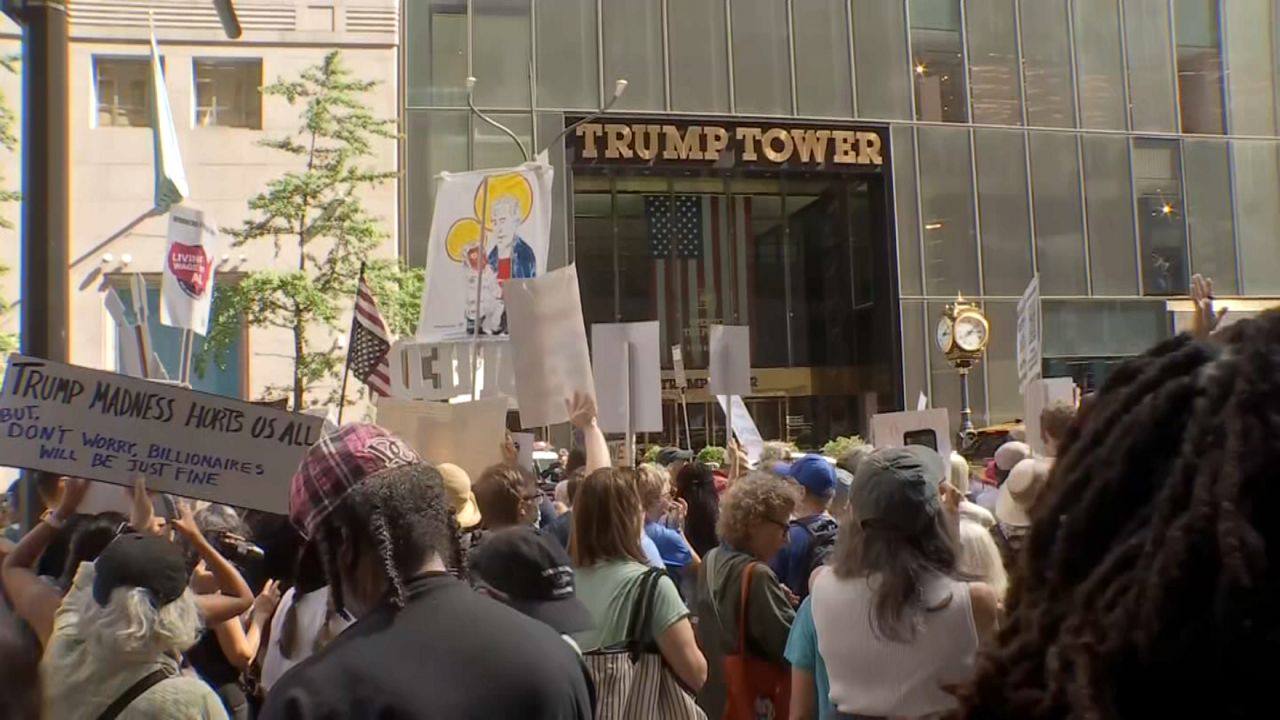 Protesters rally outside Trump Tower for higher wages
