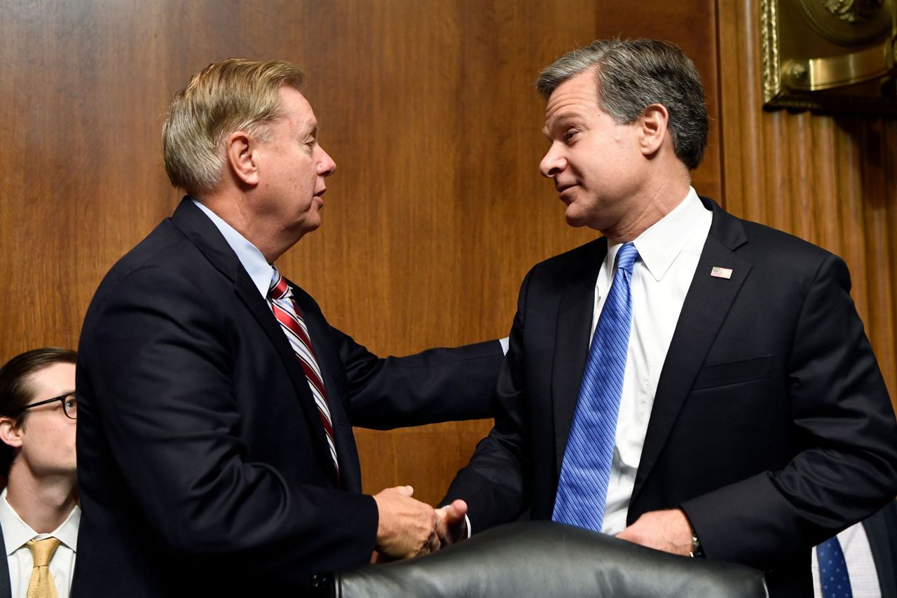 The Latest: FBI chief Wray says China poses a serious threat