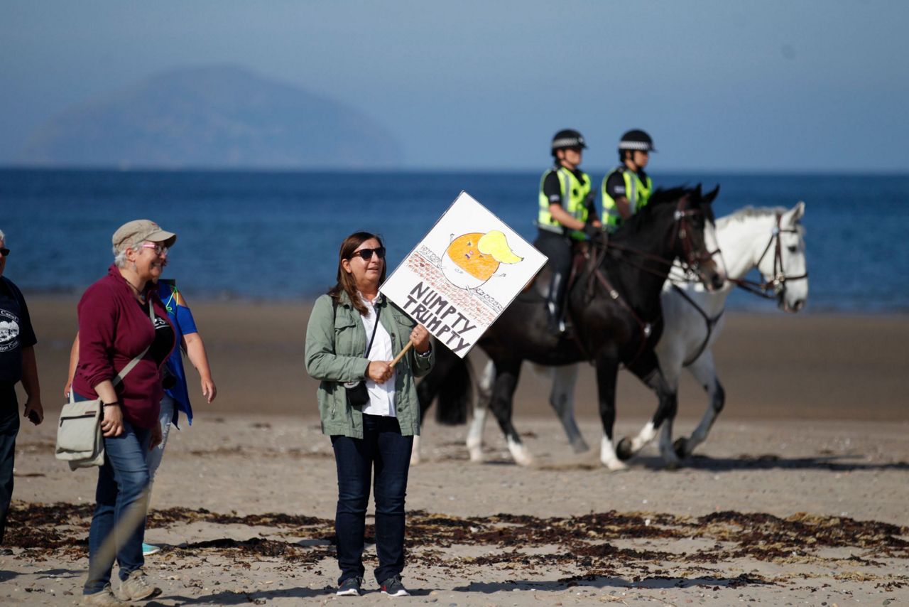 The Latest: Thousands in anti-Trump march in Scottish city