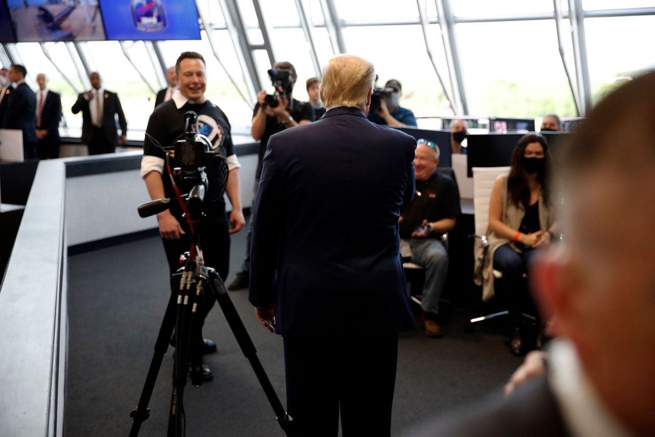 Launch provides Trump moment to relish during difficult week