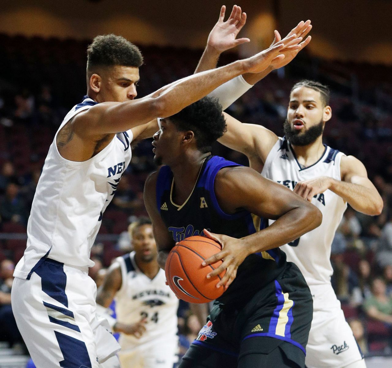 The Latest: Longhorns stun No. 7 Tar Heels in Las Vegas