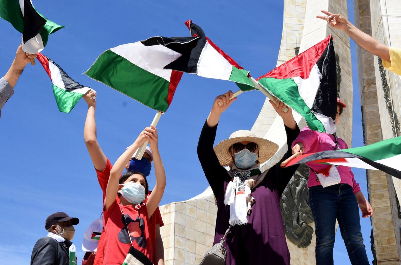 The Latest: Palestinians gather for displacement anniversary
