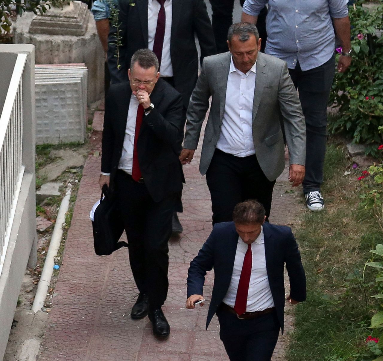 American pastor back in court for spying and terror trial