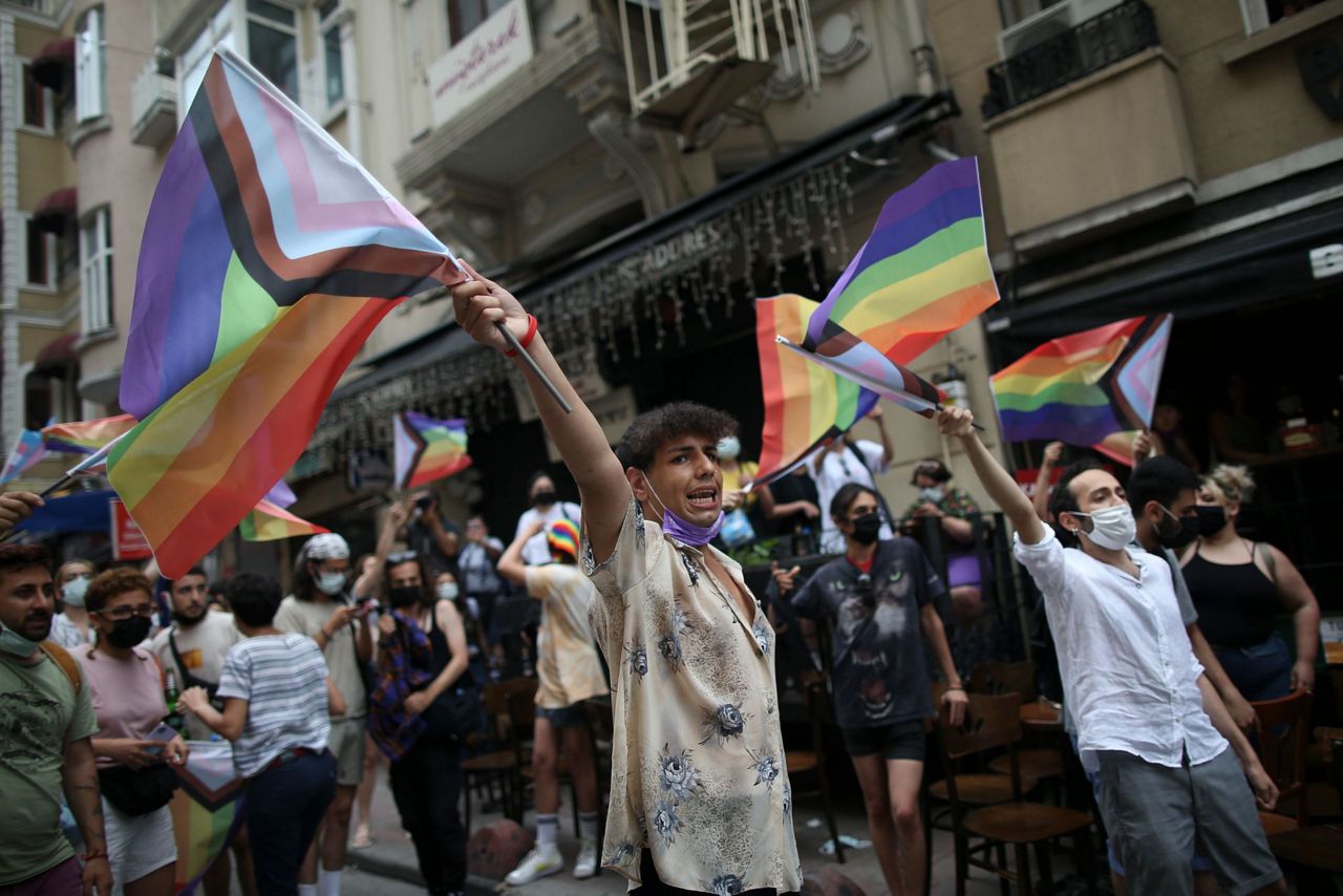 Big Pride parade in Paris; Turkish police stop marchers