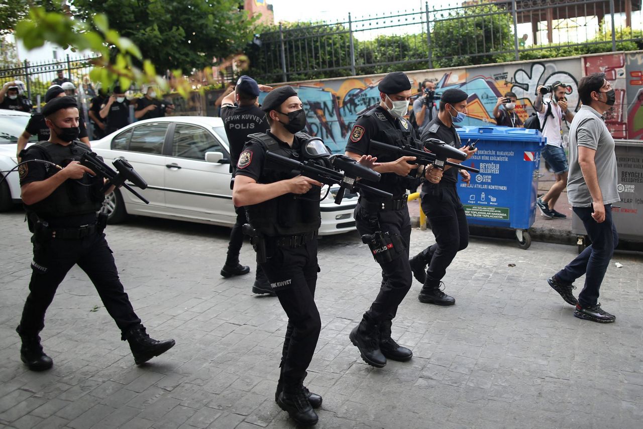 Big Pride parade in Paris; Turkish police stop marchers