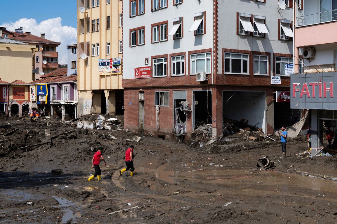Crews continue search for missing from floods in Turkey