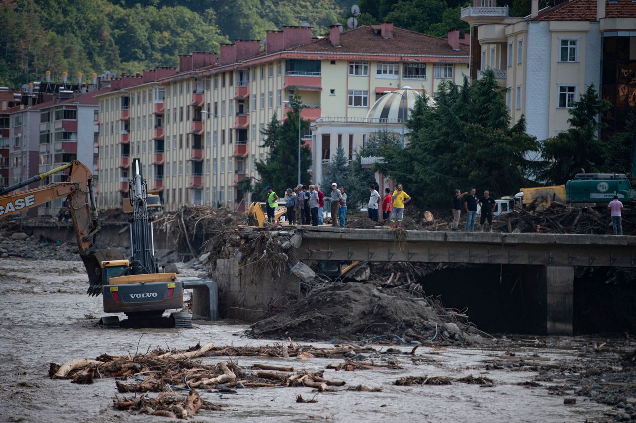 Crews continue search for missing from floods in Turkey
