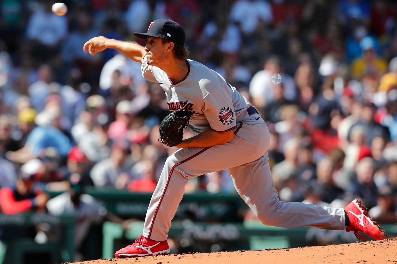 Ryan strong, Twins' bats heat up in Boston's Fenway opener