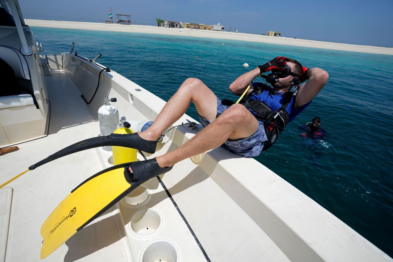 To restore reefs dying in warming seas, UAE turns to coral nurseries