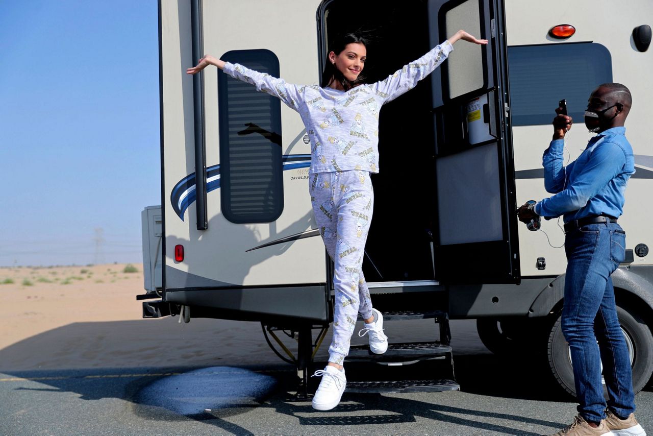 Model diplomacy: Israeli waves flag in UAE pajama photoshoot