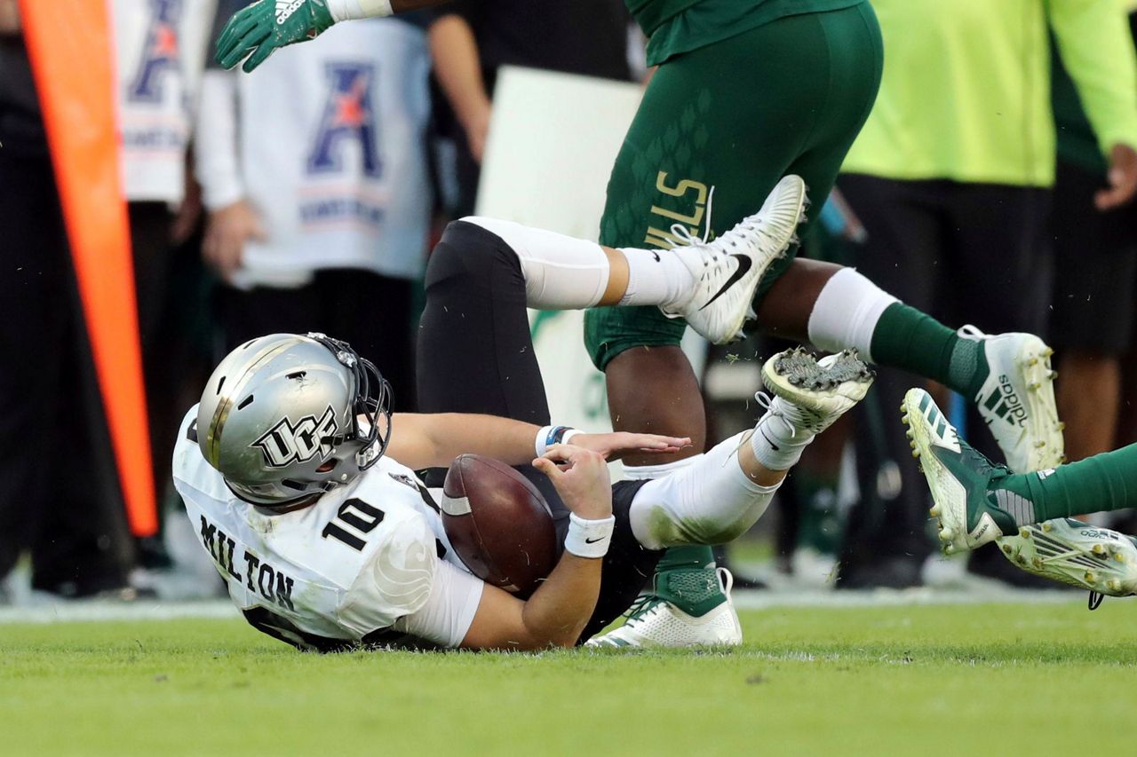 No. 8 UCF remains unbeaten, but loses QB Milton in 38-10 win