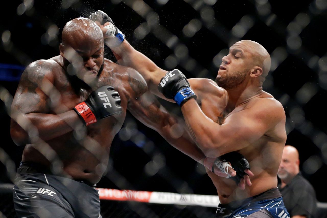 Gane stops Lewis, wins interim heavyweight title at UFC 265