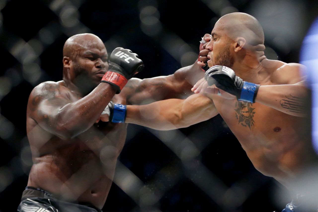 Gane stops Lewis, wins interim heavyweight title at UFC 265