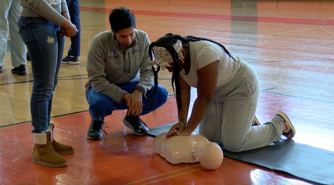 UMass Chan students bring CPR training to North High School