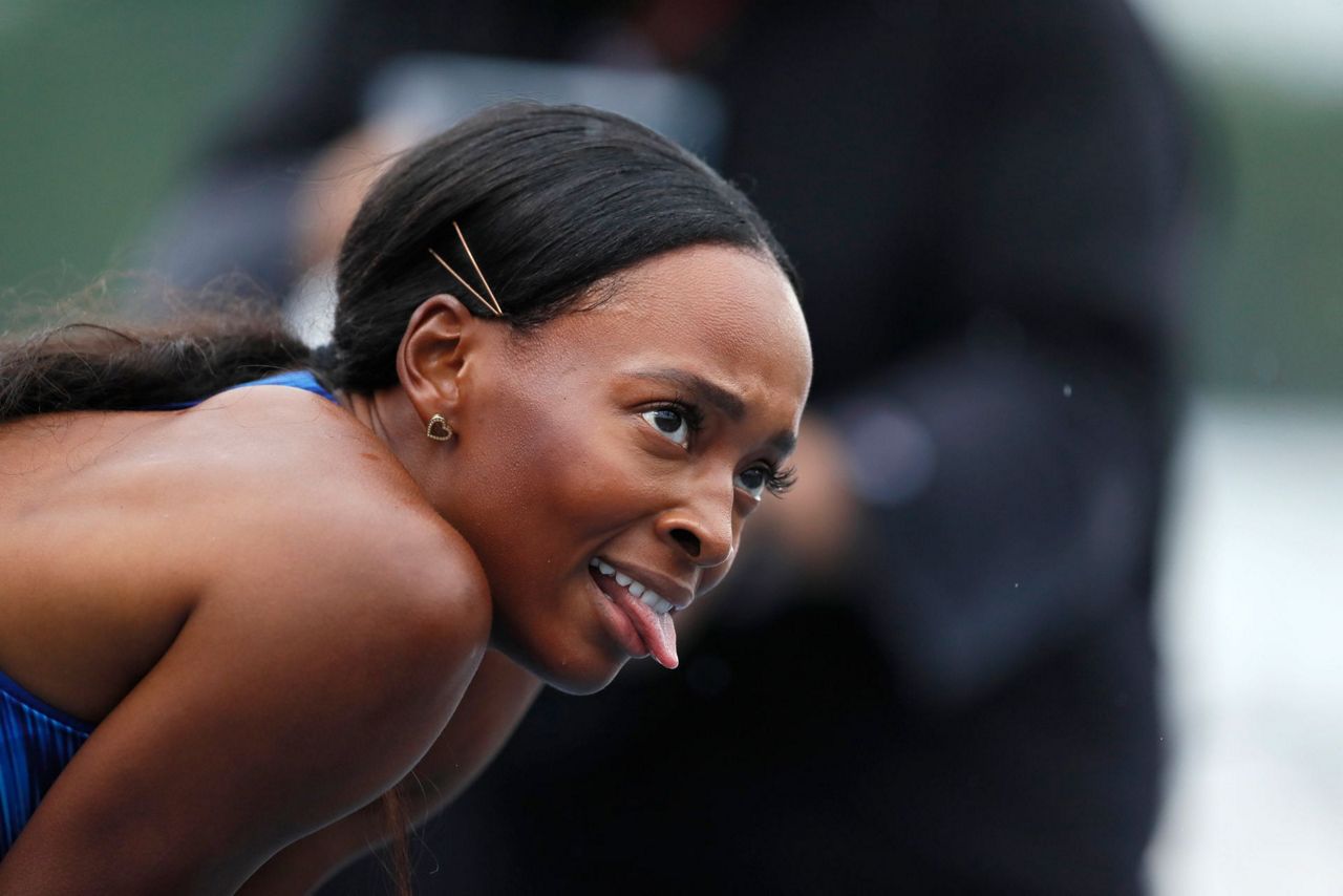 Muhammad breaks world record in 400 hurdles at nationals