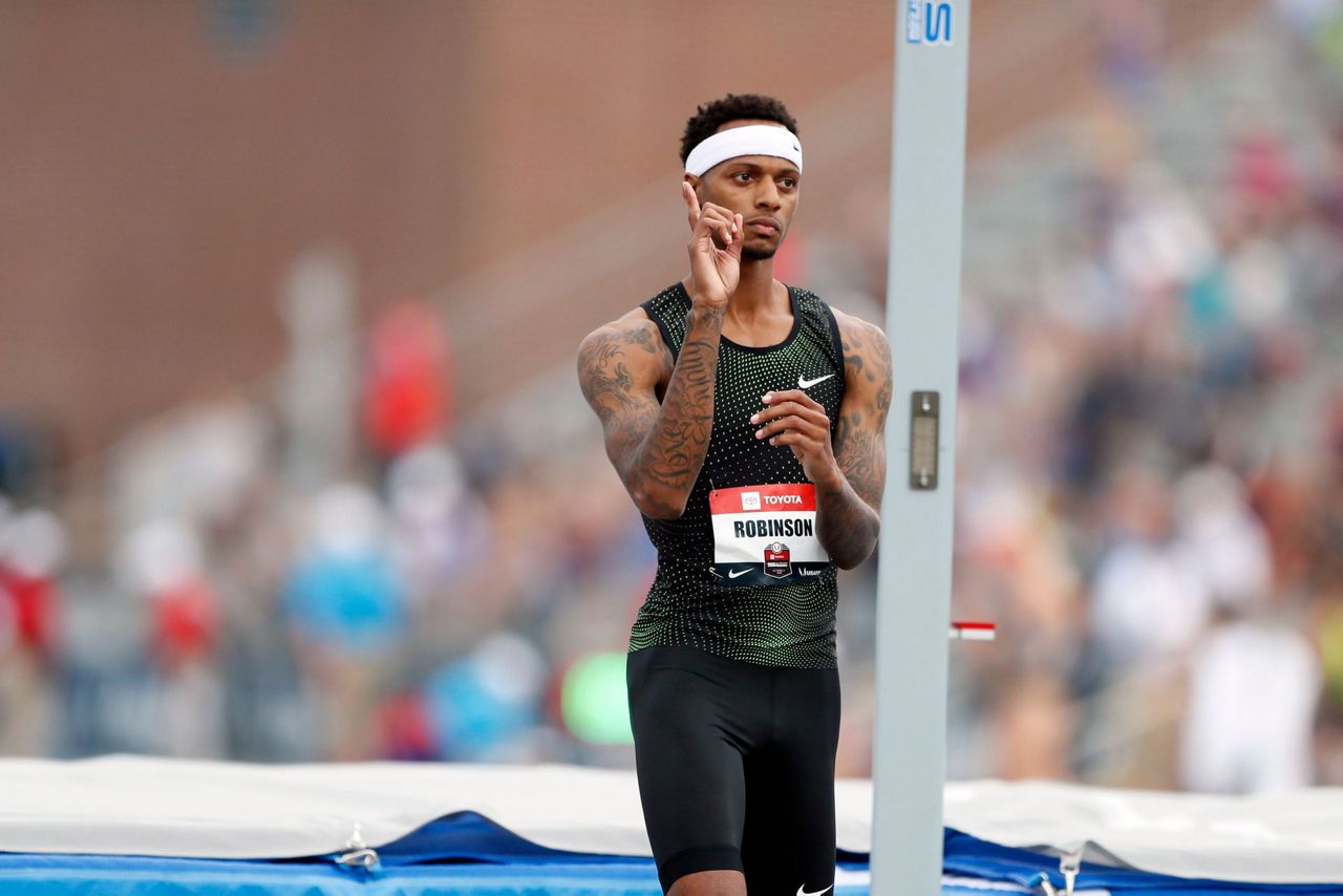 Muhammad breaks world record in 400 hurdles at nationals