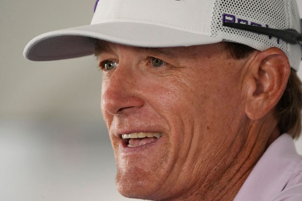 Part-time Uber driver Henson travels world to get to US Open