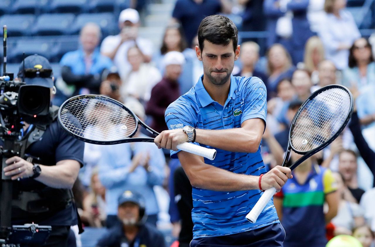 The Latest: US Open play begins, with 8 ex-champs in lineup