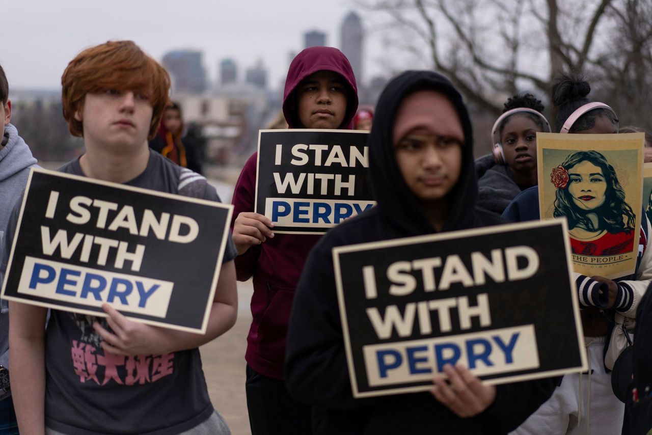 Students rally at the Iowa Capitol days after Perry school shooting