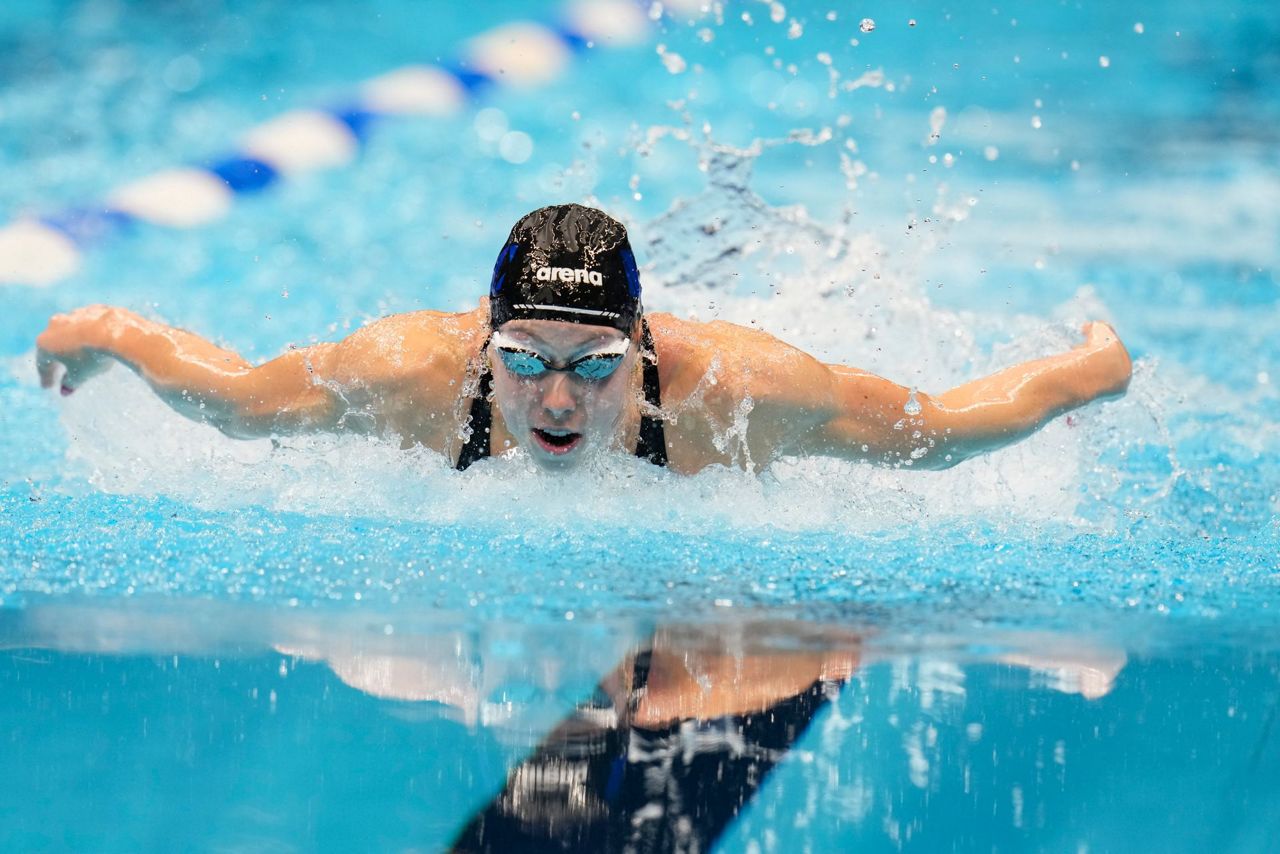 Gretchen Walsh sets a world record in the 100-meter butterfly at the U ...