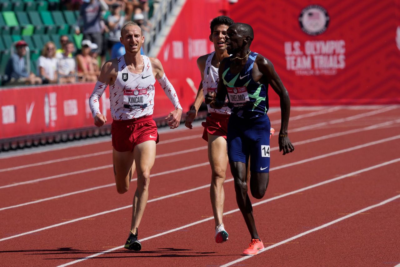 The Latest: Chelimo holds off charge in rough 5K at trials