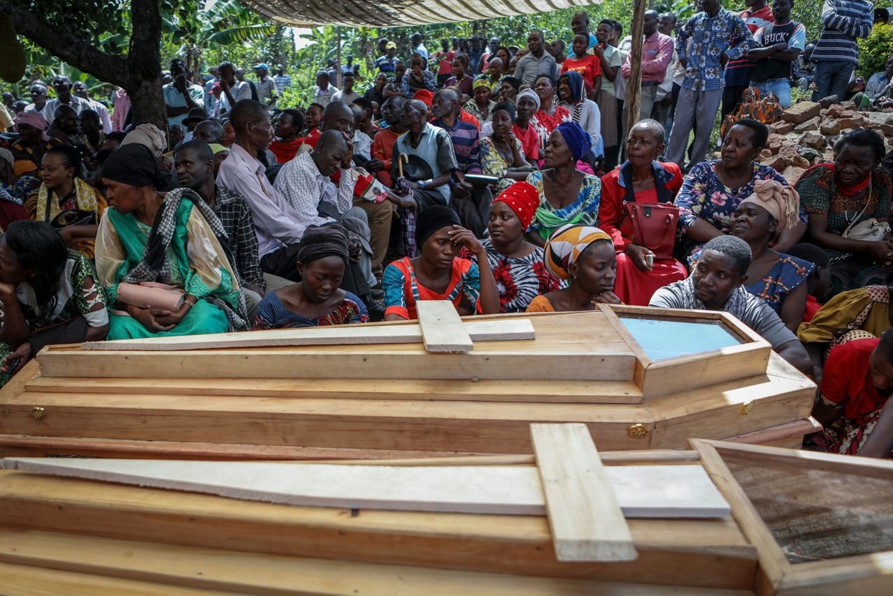 Ugandan border town prepares to bury victims of rebel massacre that ...