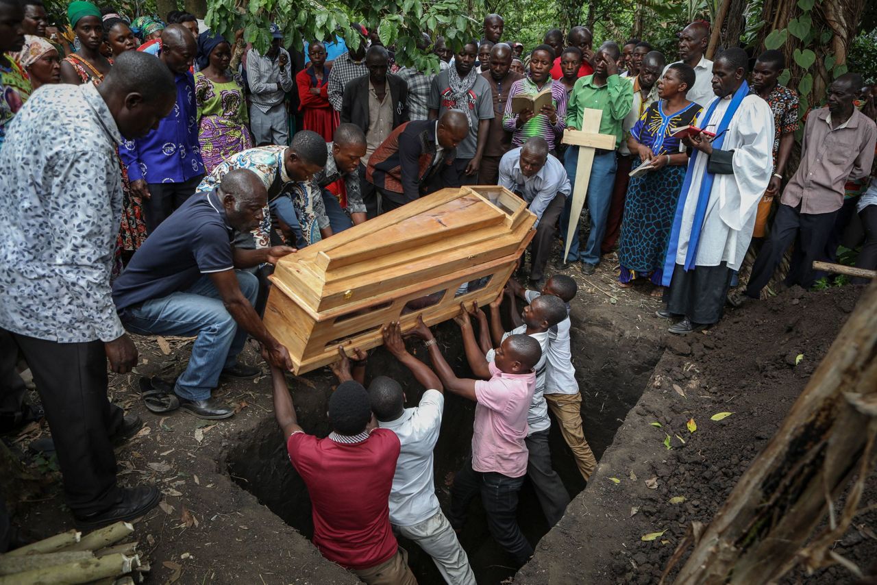 Ugandan border town prepares to bury victims of rebel massacre that ...