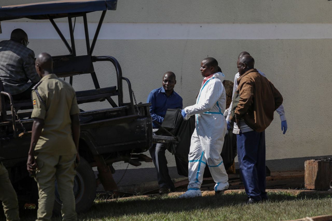 Police say 11, including kids, killed in Uganda school fire