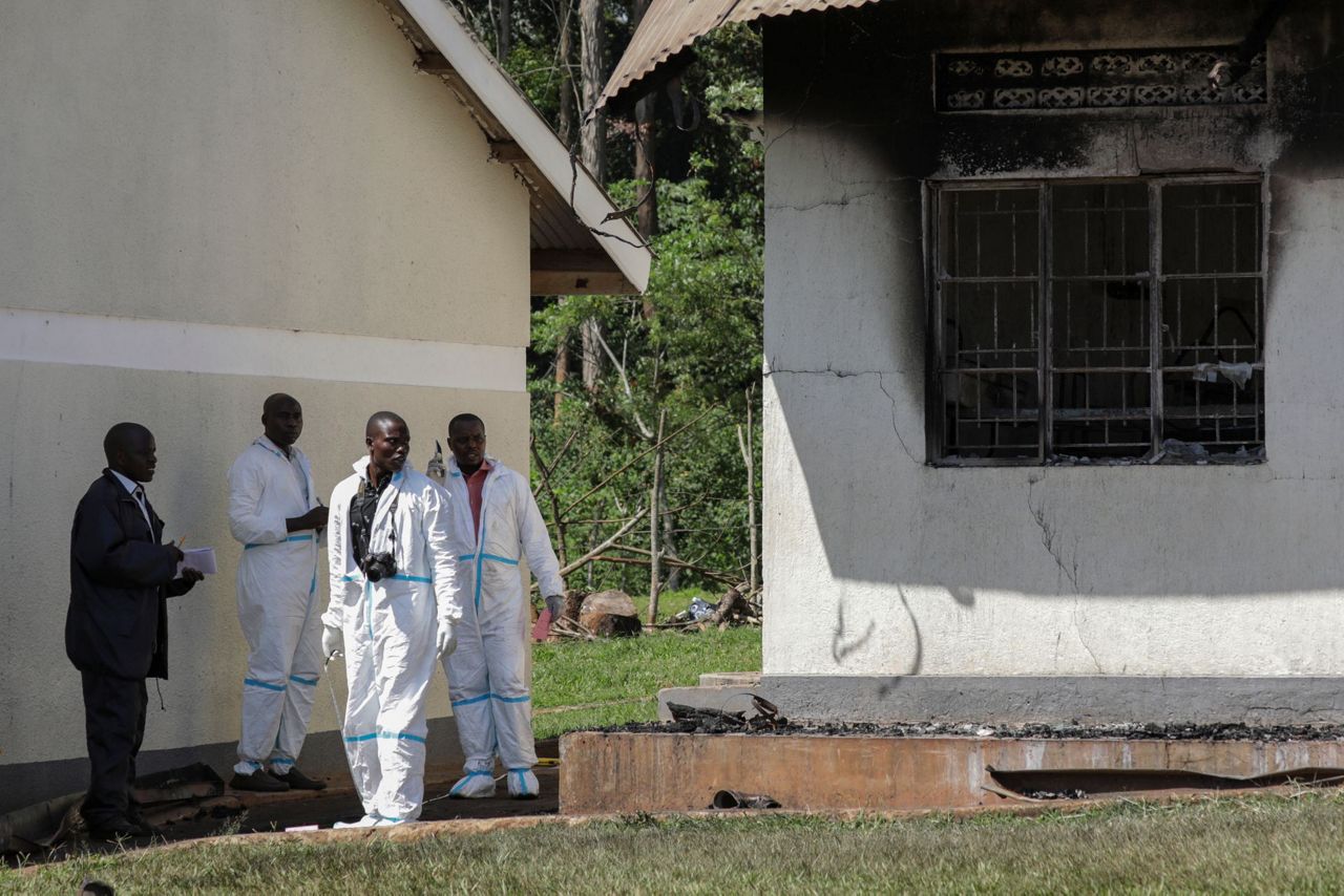 Police say 11, including kids, killed in Uganda school fire