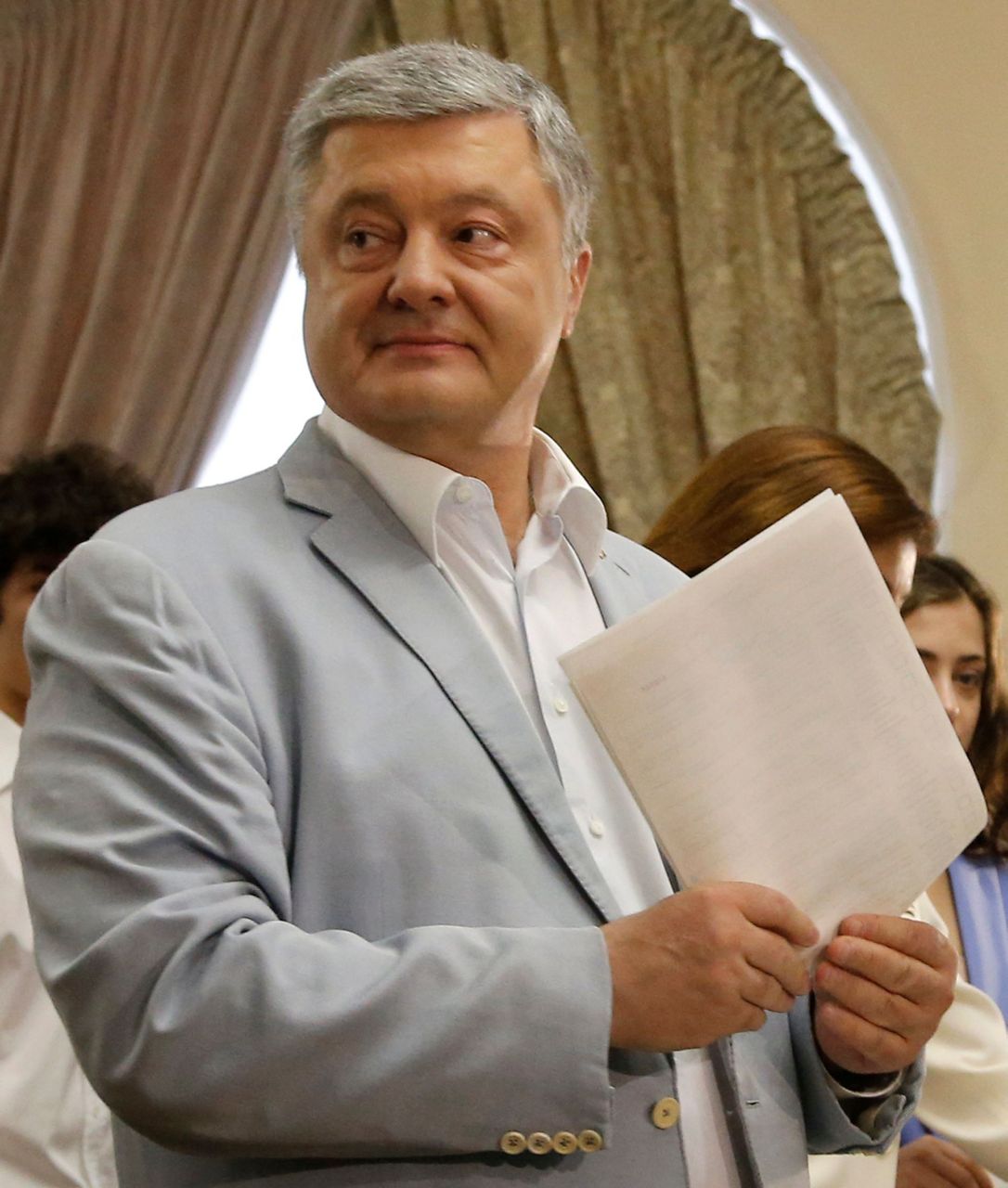 The Latest: Ukraine's leader vows to end lawmaker immunity
