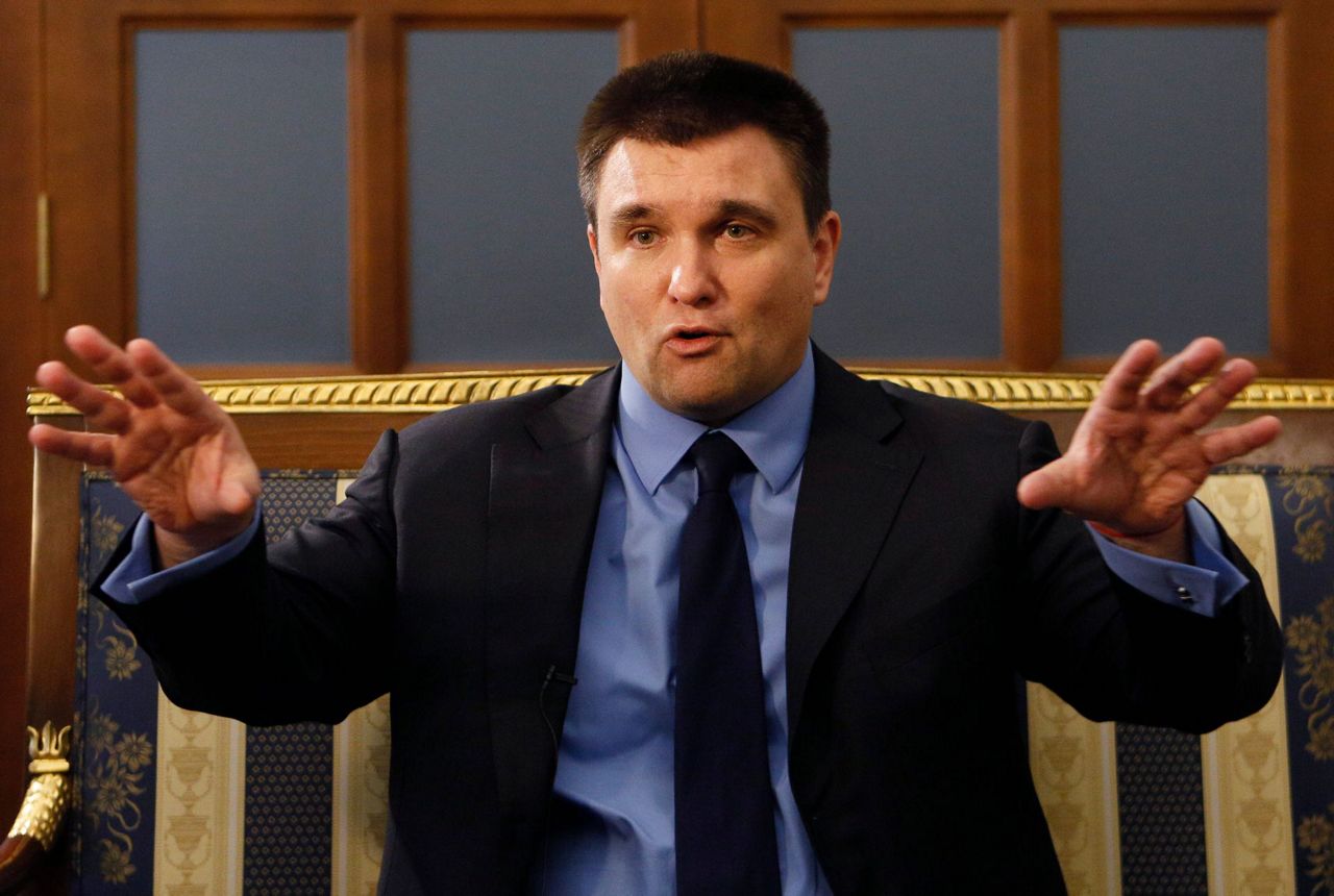 AP Interview: Ukraine minister claims Russia on its knees