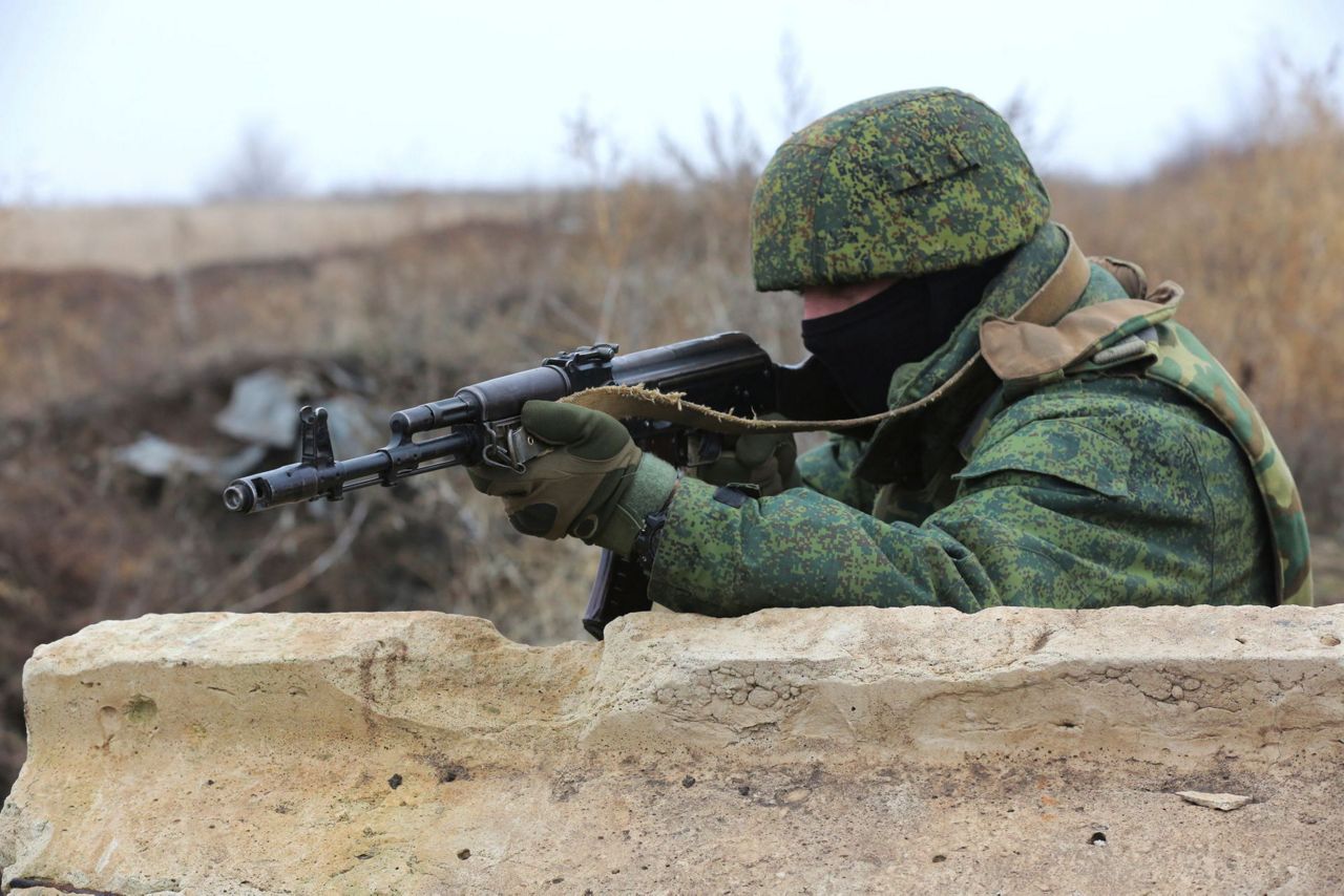 Russia warns Kyiv against use of force in rebel regions