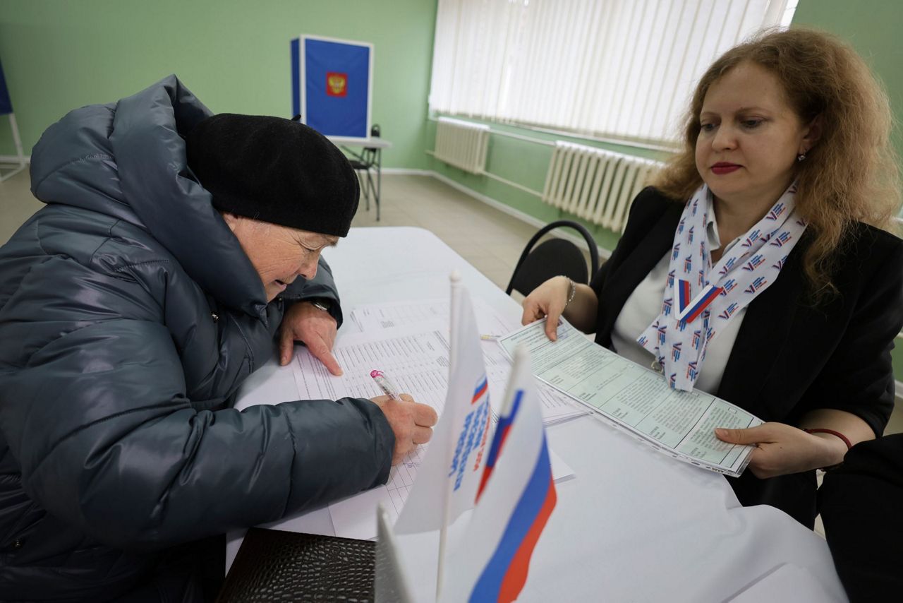 Russians head to polls in a vote set to extend Putin's rule. His foes ...