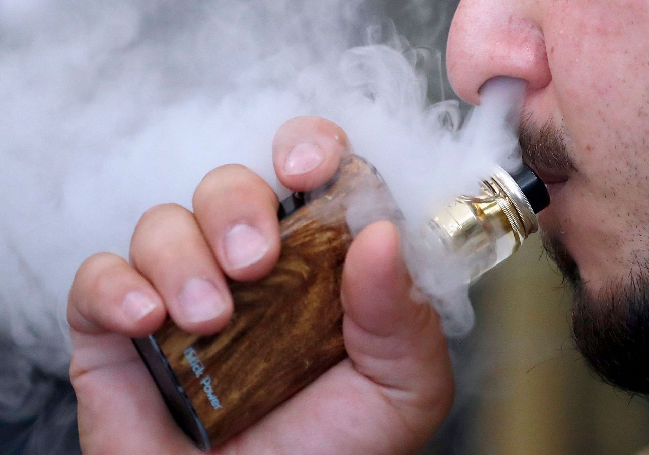 Keep calm and vape on: UK embraces e-cigarettes, US cautious