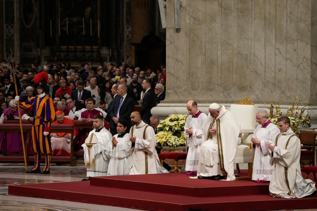 Pope says 'our hearts are in Bethlehem' as he presides over the Christmas Eve Mass in St. Peter's