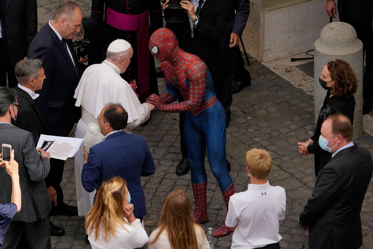 'Super-hero' in Spider-Man outfit meets pope at Vatican