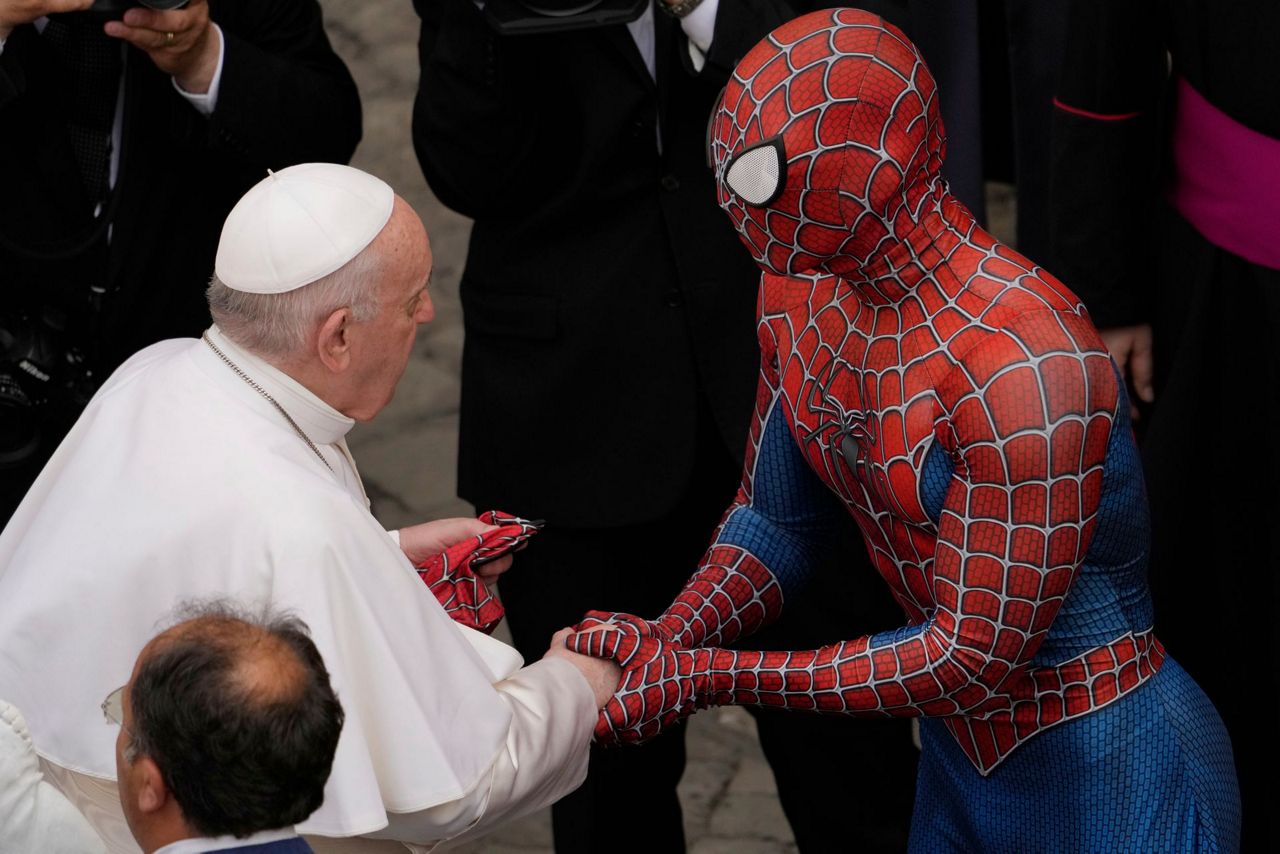'Super-hero' in Spider-Man outfit meets pope at Vatican
