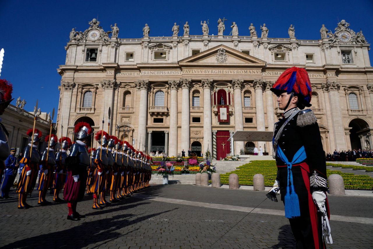 Pope, big crowd mark Easter in flower-adorned Vatican square