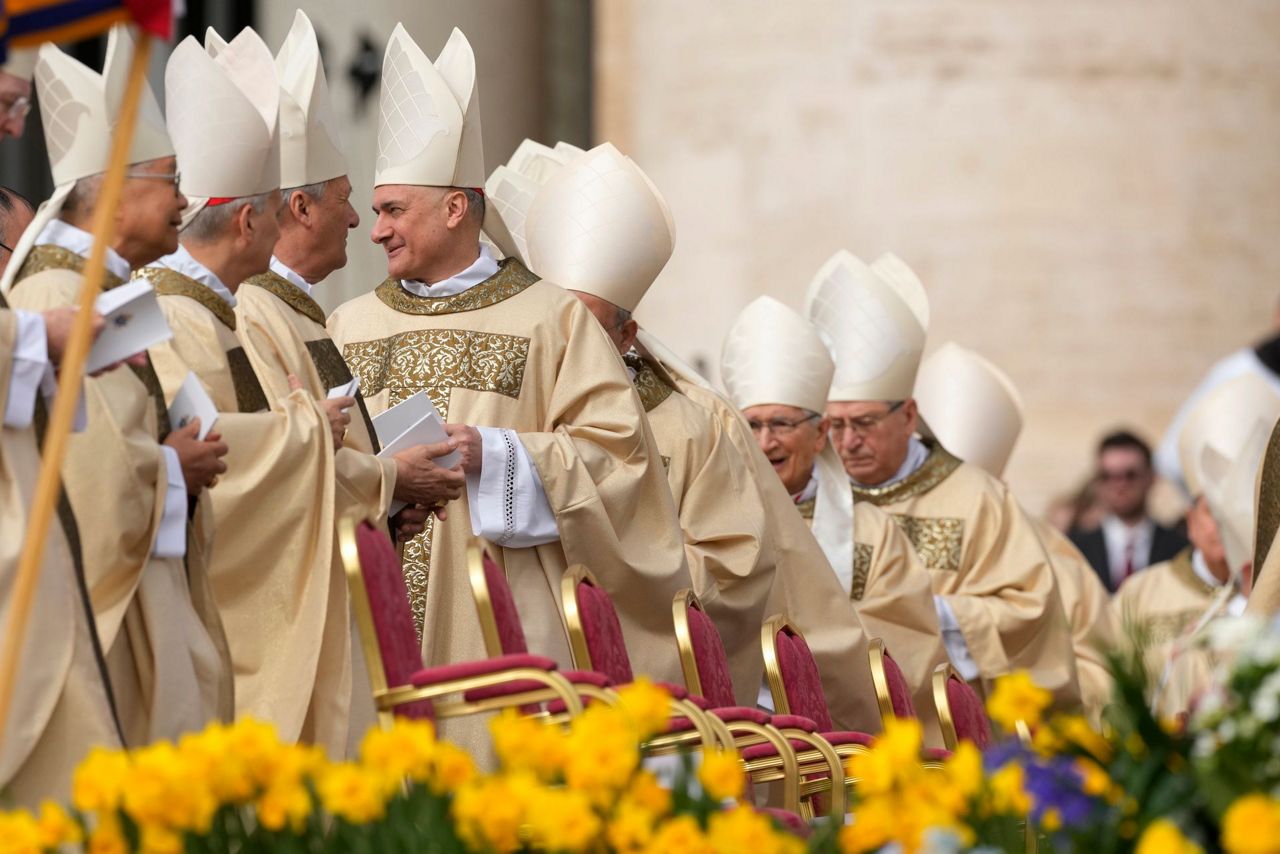 Pope overcomes health concerns to preside over a blustery Easter Sunday ...