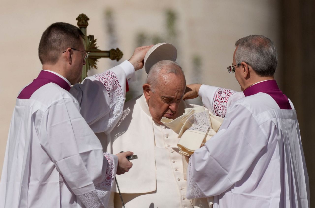 Pope, big crowd mark Easter in flower-adorned Vatican square