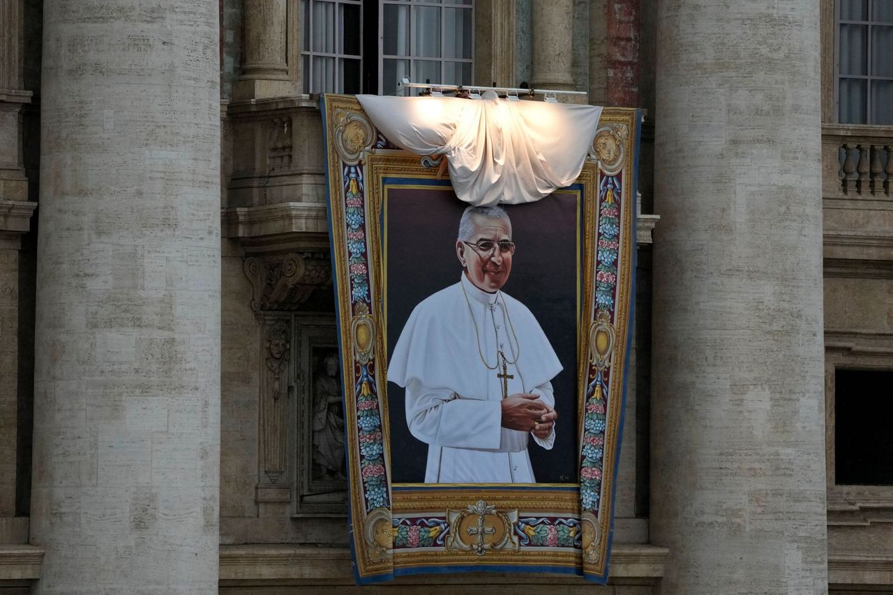 John Paul I, briefly serving, 'smiling" pope, is beatified