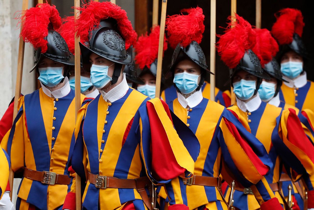 "We're working on it:" Pope's COVID advisors and the mask